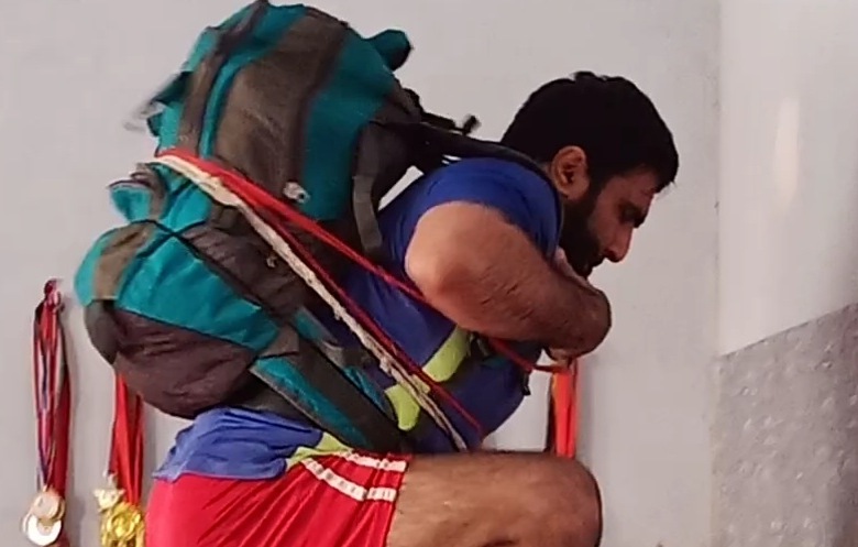 Highest standing jump carrying a 100 lb pack (male) | Guinness World ...